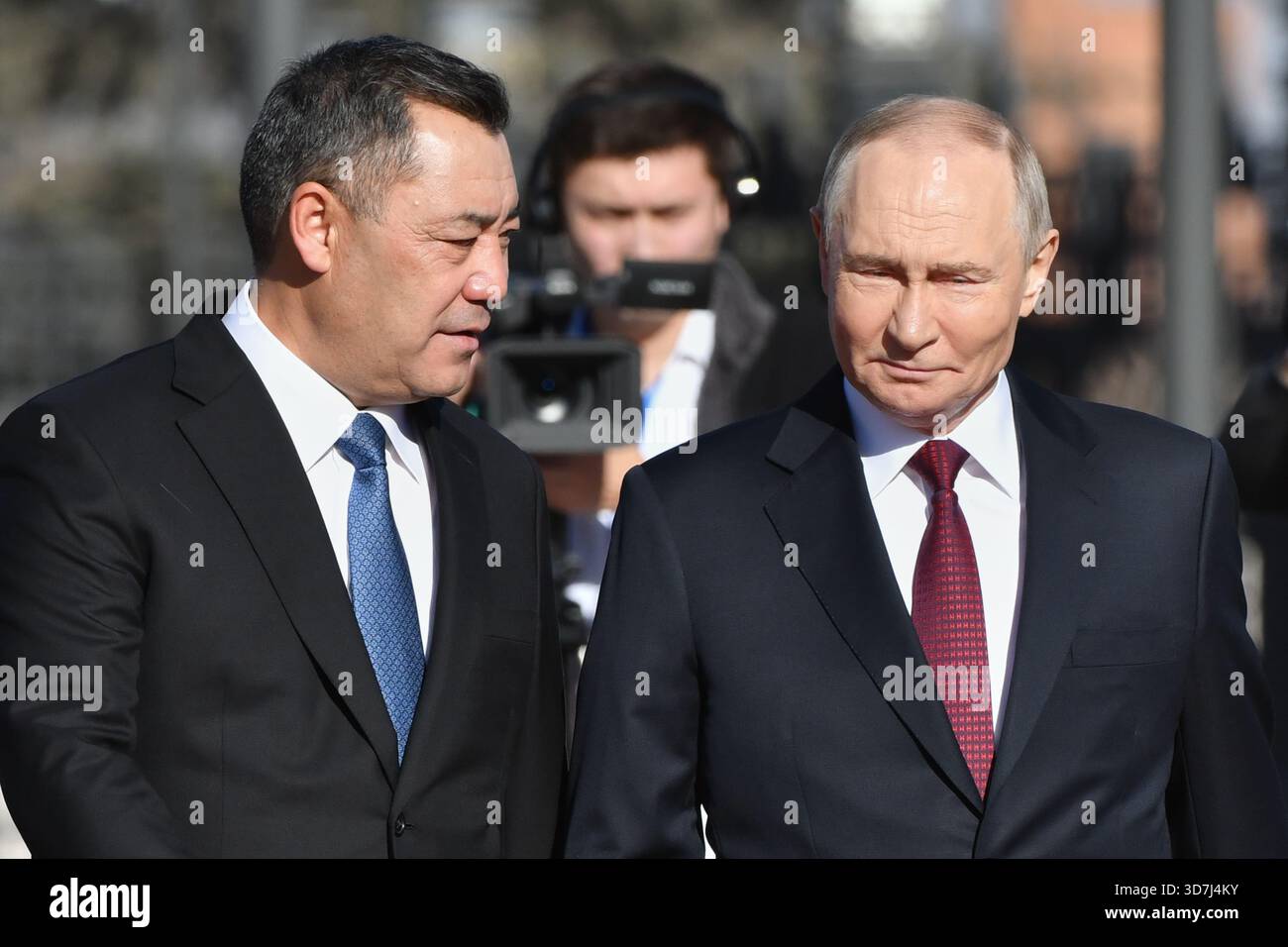 Kyrgyzstan's President Sadyr Japarov, left, and Russian President ...