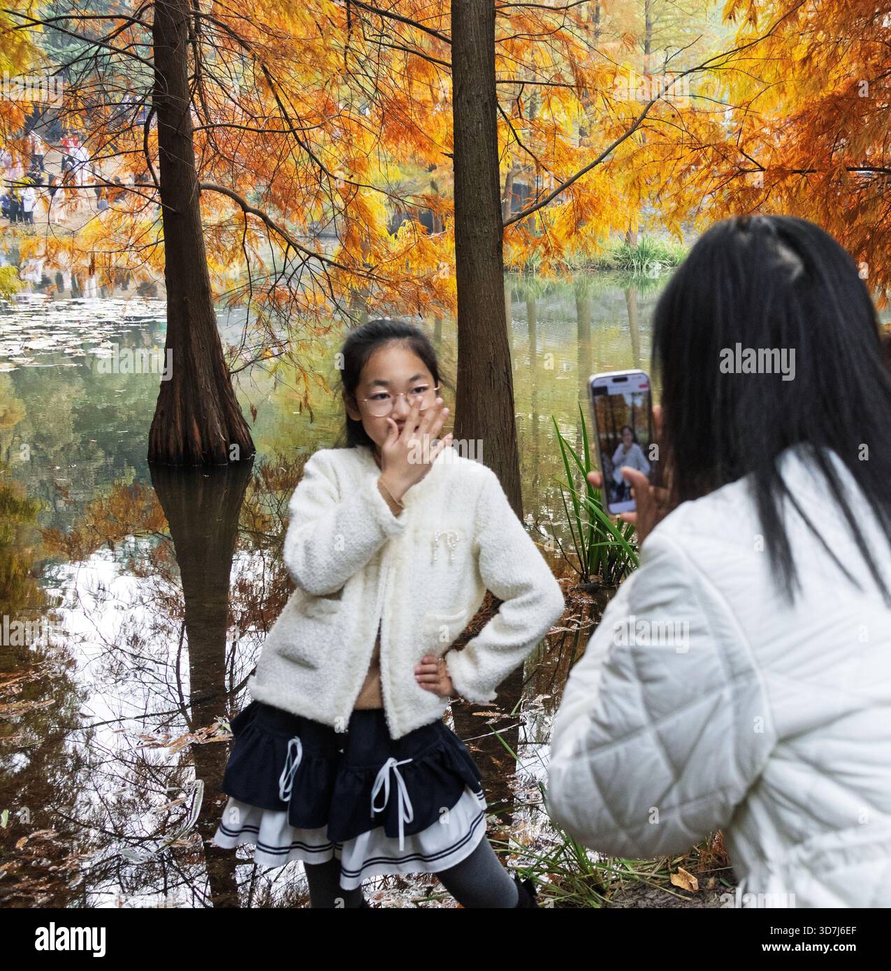 Tourists admire early winter scenery at Ming Xiaoling Mausoleum Scenic Area in Nanjing City ...