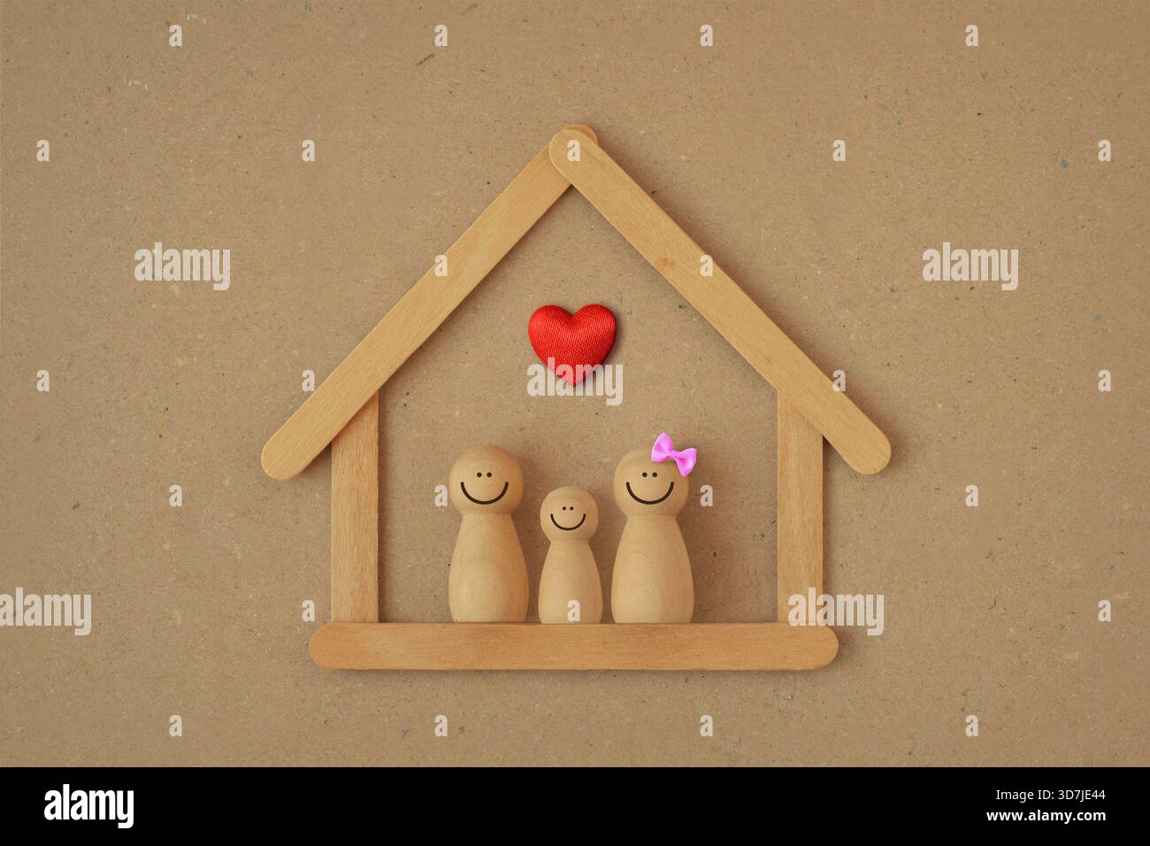 Wooden pawn family in a house made of wooden sticks with heart - Love ...
