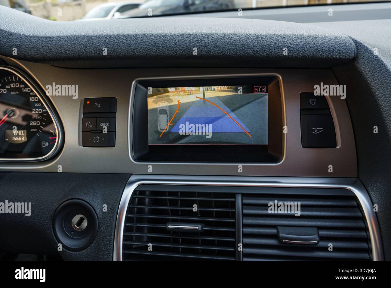 Rear view camera display shows guidelines while parking in a vehicle ...