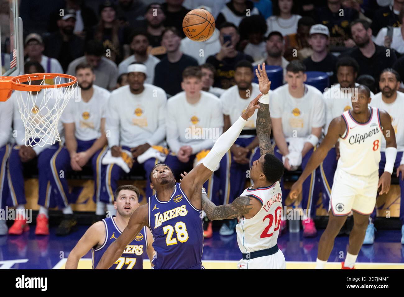 Los Angeles Clippers' John Collins (20) shoots against Los Angeles ...