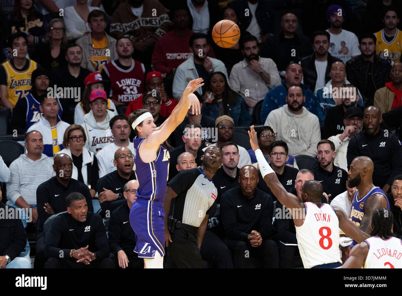 Los Angeles Lakers’ Austin Reaves (15) shoots against Los Angeles ...
