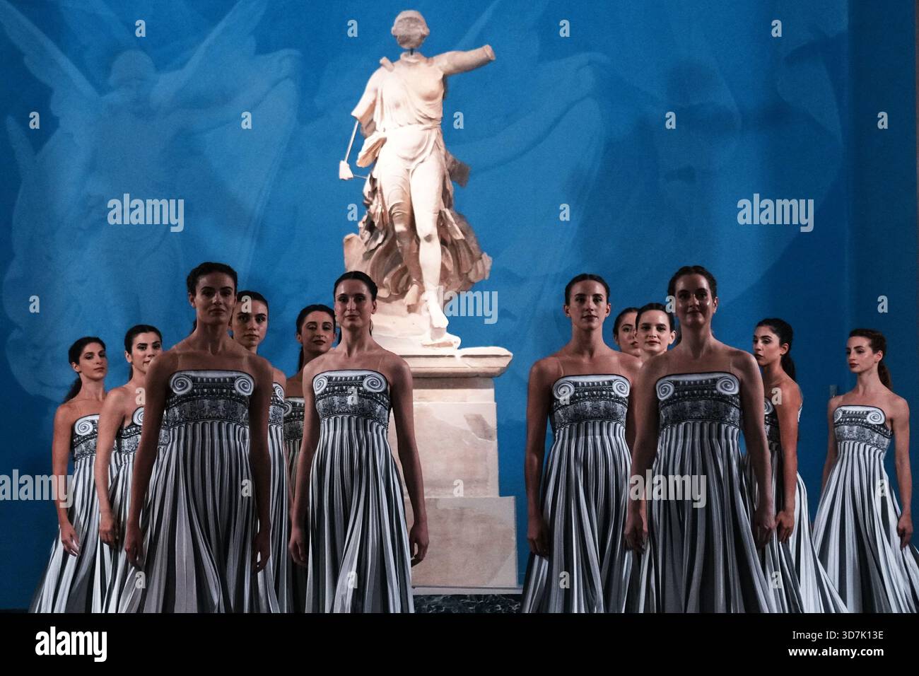 The Priestesses enter the room during the flame lighting ceremony for ...