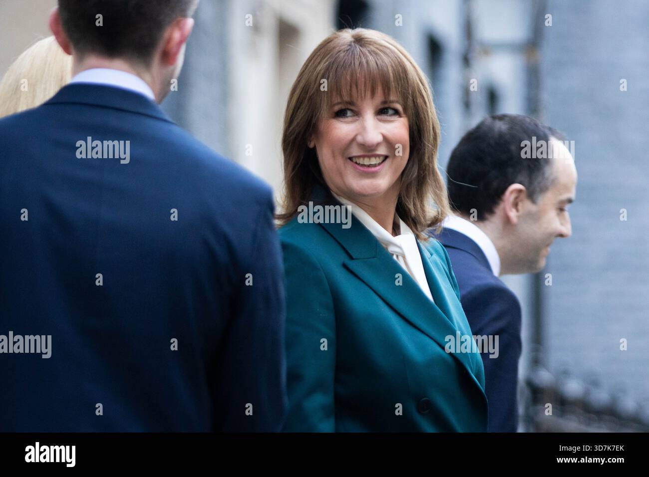 Chancellor of the Exchequer Rachel Reeves (centre) poses outside 11 ...