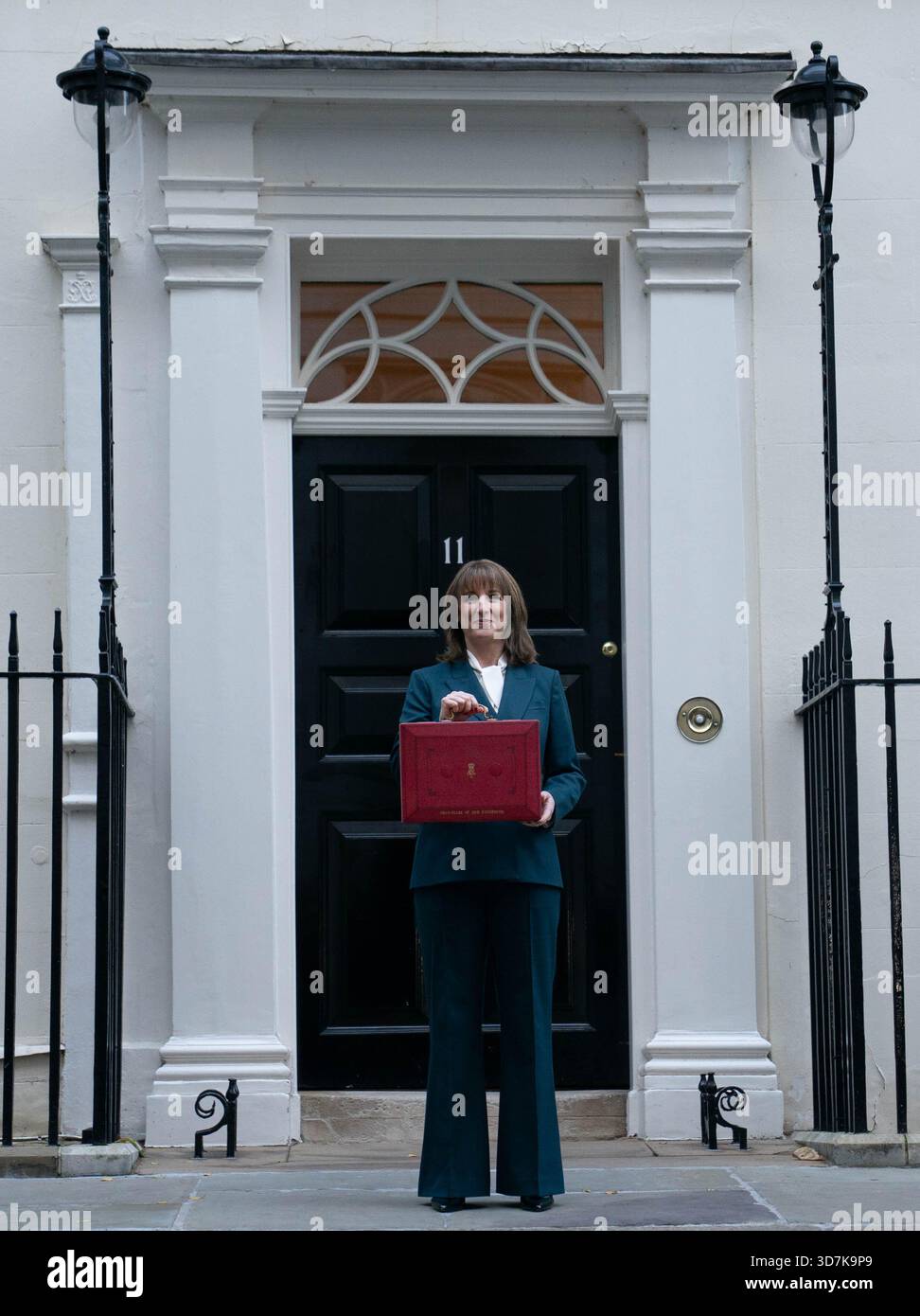 Chancellor of the Exchequer Rachel Reeves (centre) poses outside 11 ...