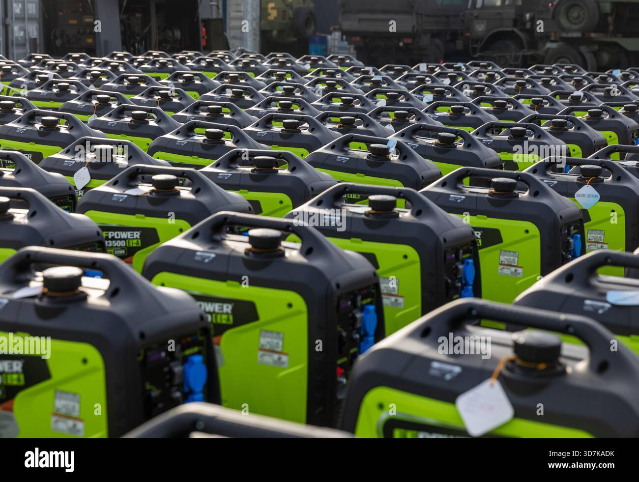 A row of new, portable electric generators, branded "EFPOWER," is seen ...