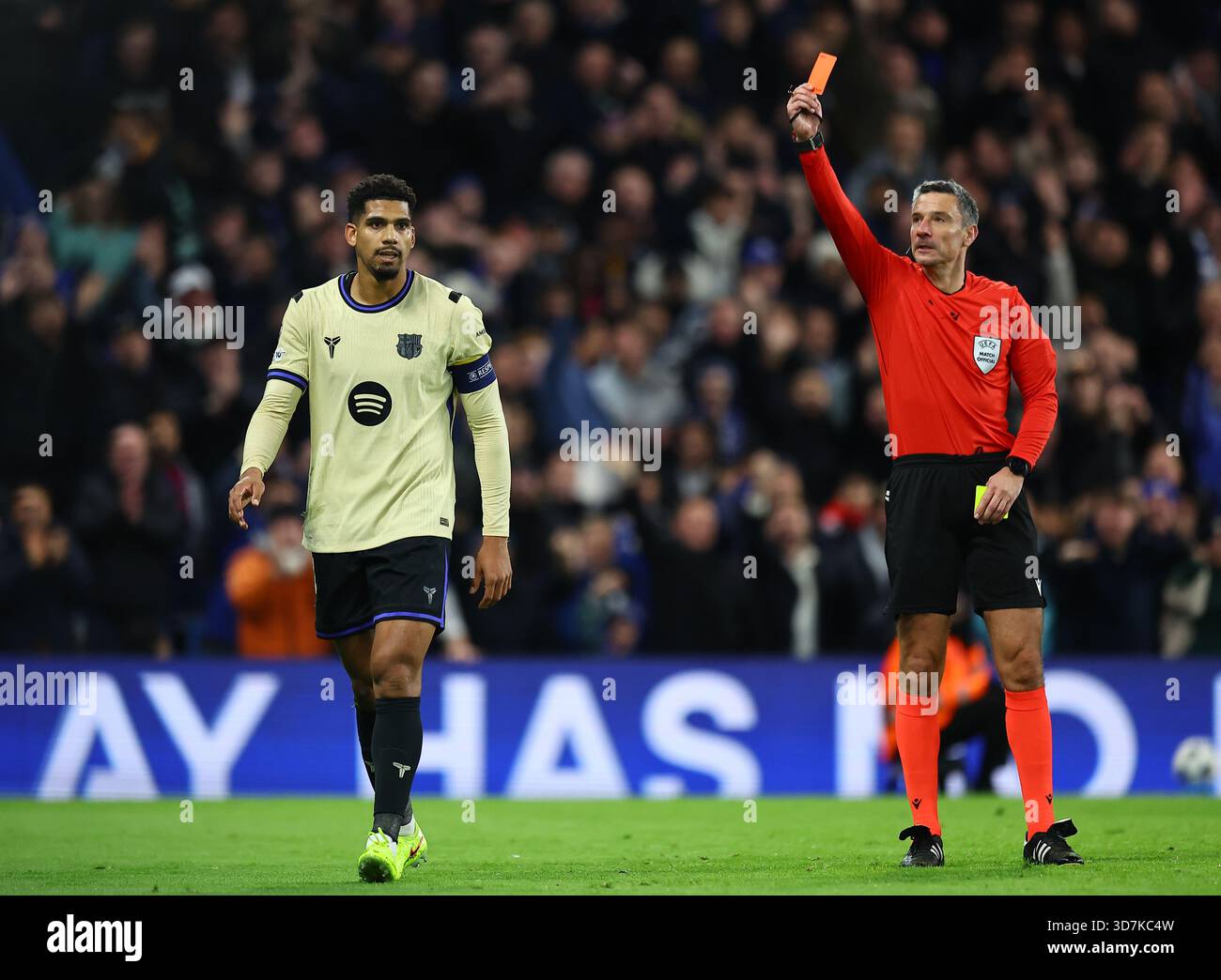 Ronald Araujo of Barcelona is shown a red card during Chelsea and ...