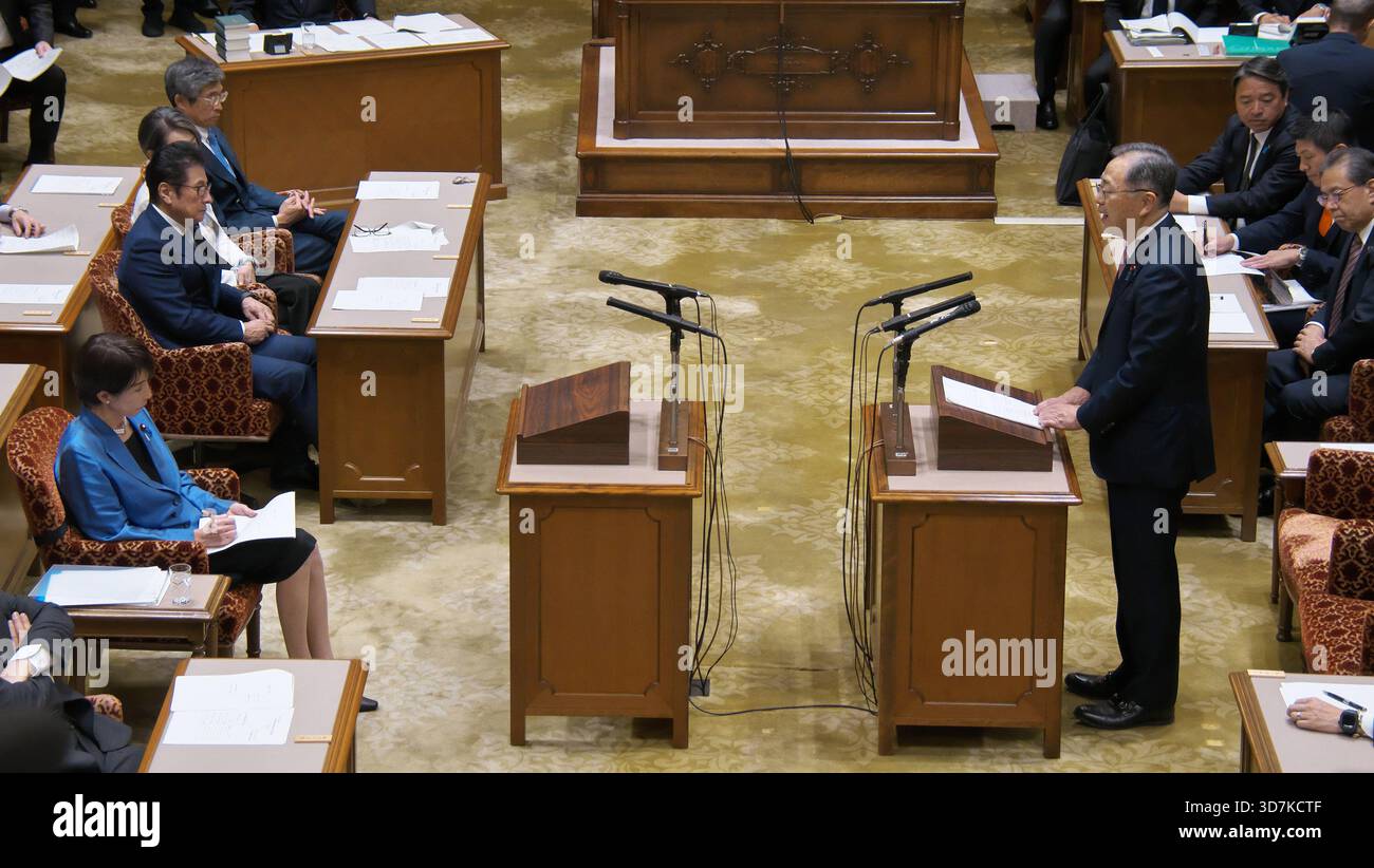Leader of the opposition New Komeito party Tetsuo Saito asks Japan's ...