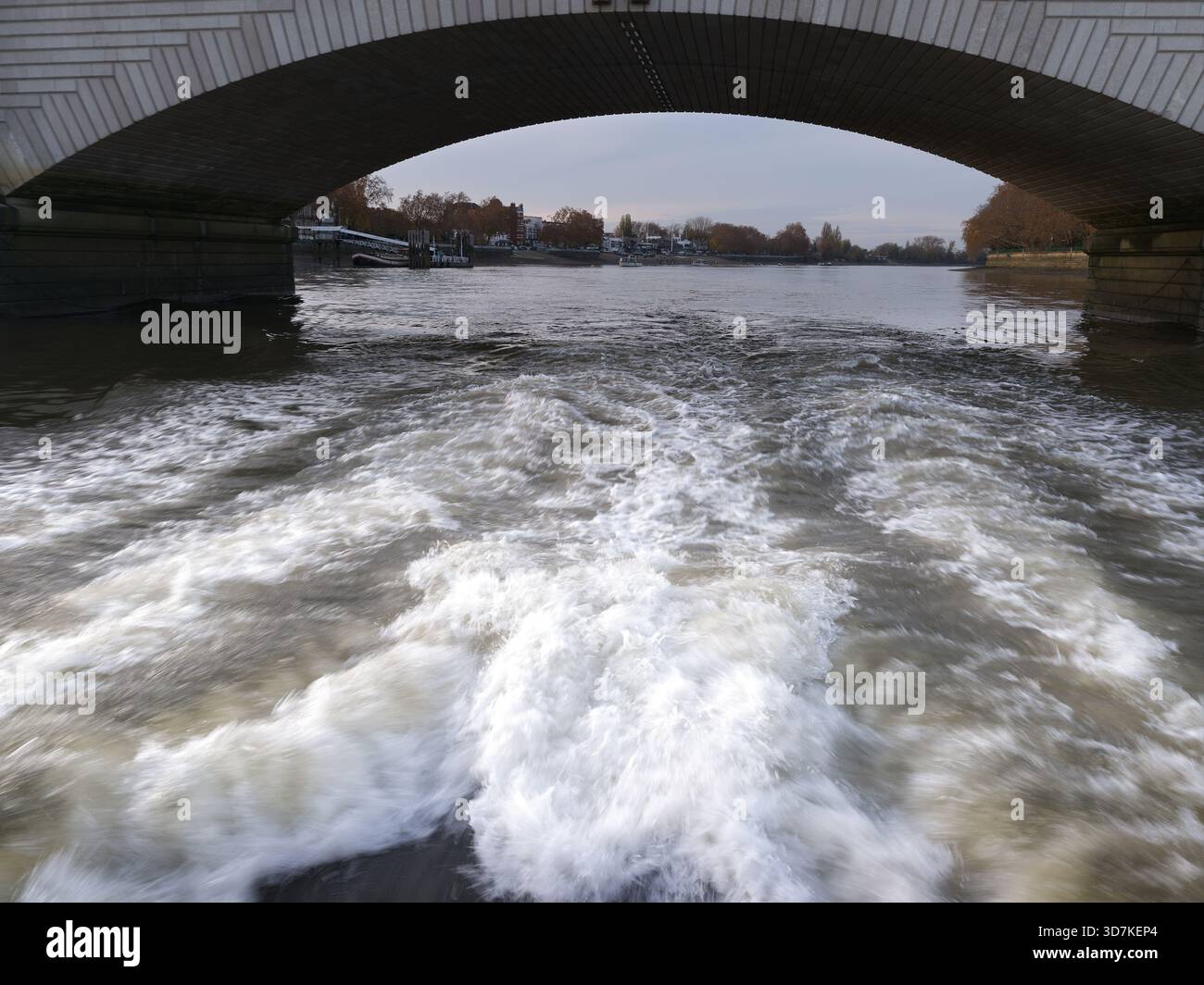 Agitated water by Putney bridge over the river Thames, London, England ...