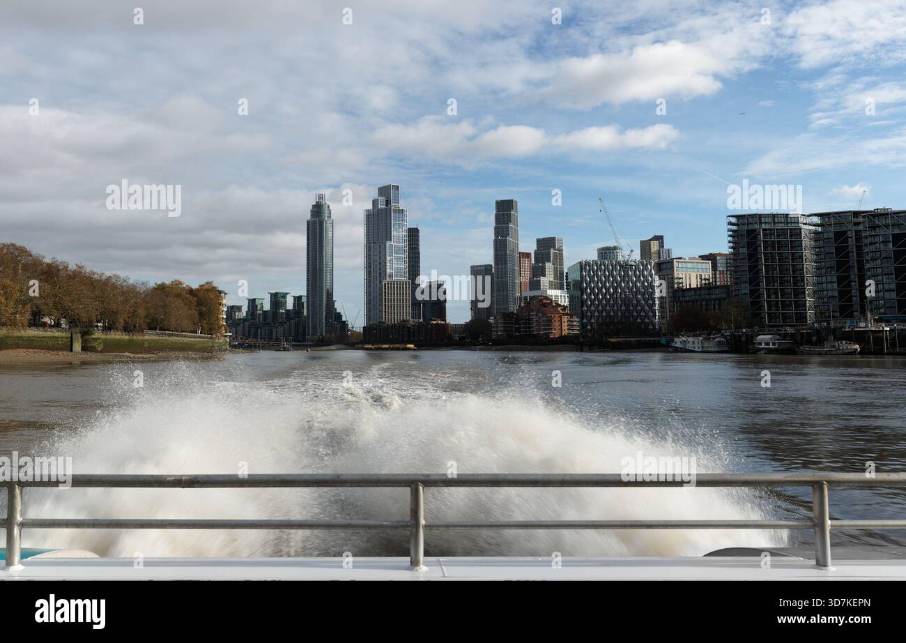 High rise apartment blocks on a bank of the river Thames at Vauxhall ...