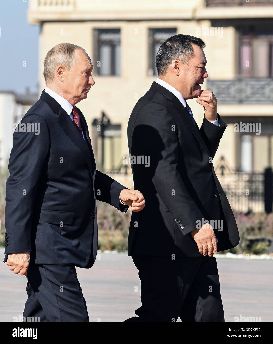 Russian President Vladimir Putin (left) and Kyrgyz President Sadyr ...