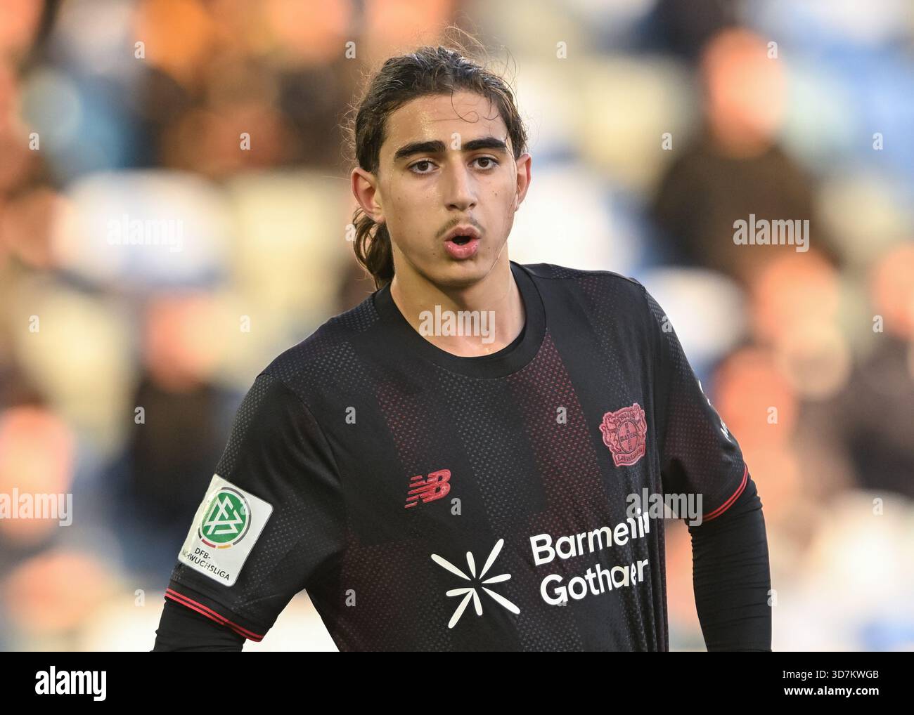 Manchester, England, 25th November 2025. Burak Kir of Bayer Leverkusen ...