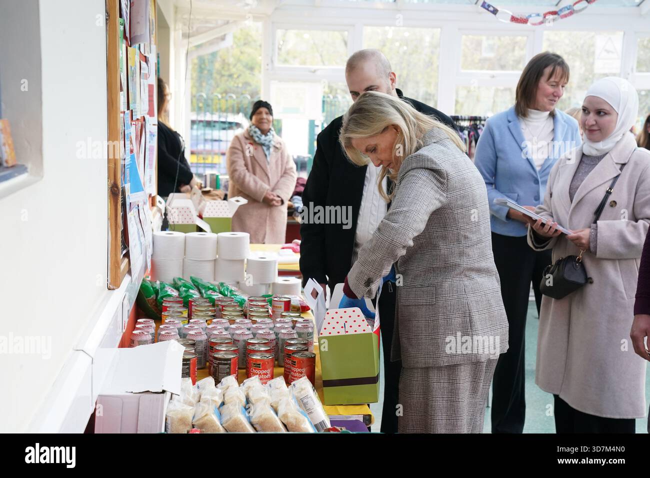 The Duchess of Edinburgh helps to pack a hamper during a visit to the ...