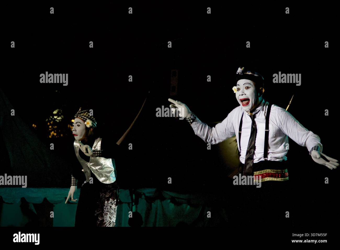 Mime artists from the Dewata Mime pantomime group from Bali pose ...
