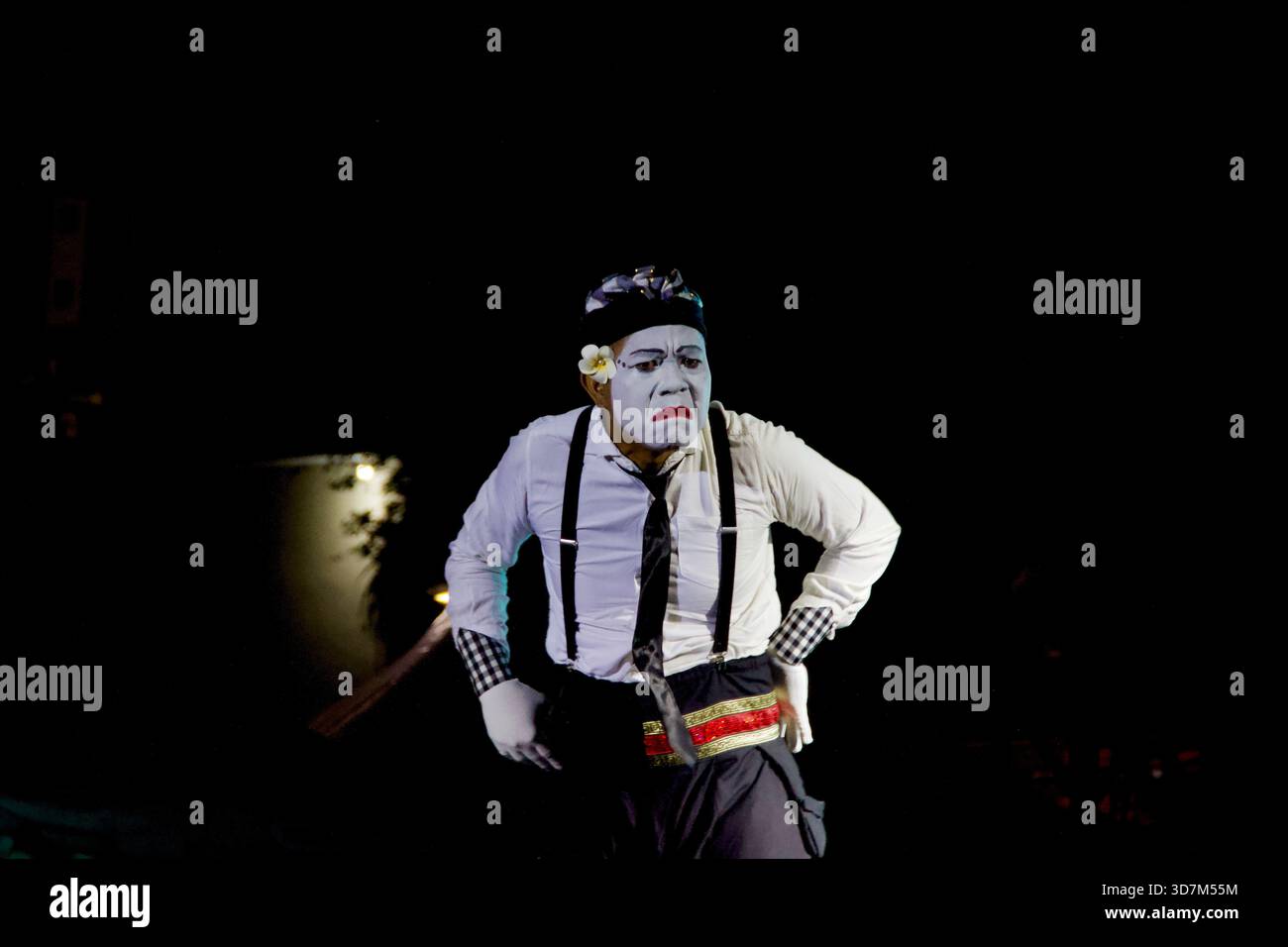 Mime artists from the Dewata Mime pantomime group from Bali pose ...