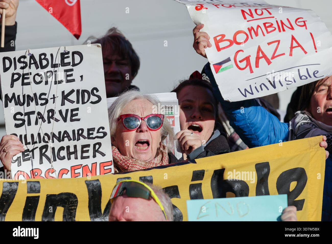 London. UK. 26 Nov 2025. Members of the Unite Union hold signs during a ...