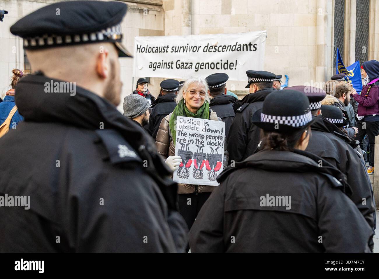 Placard being held at Defend Our Juries protest on the ban of Palestine ...