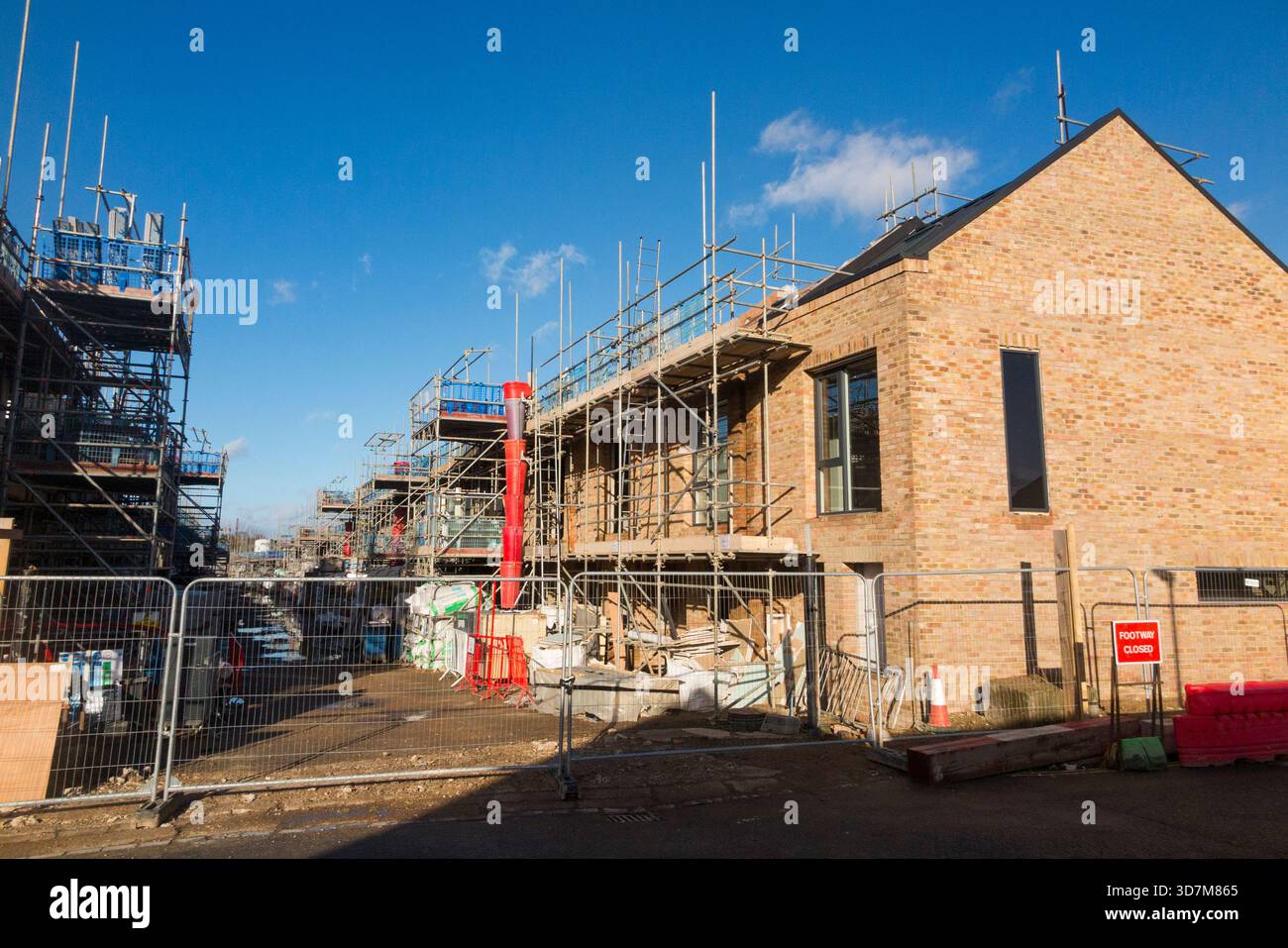 Construction site & partly built townhouses / housing block / new build ...