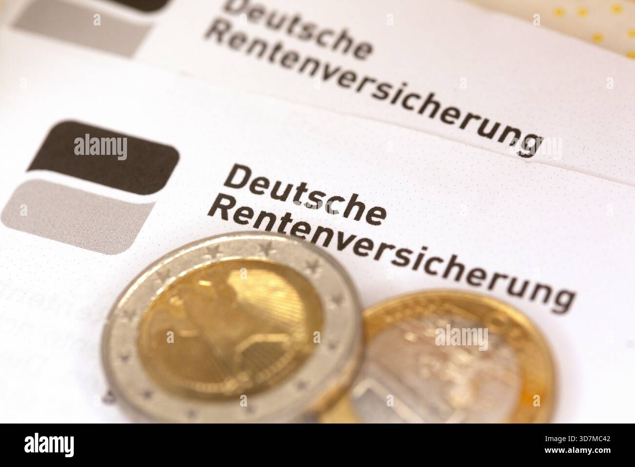 ILLUSTRATION - 26 November 2025, Berlin: Euro coins are on a letter ...