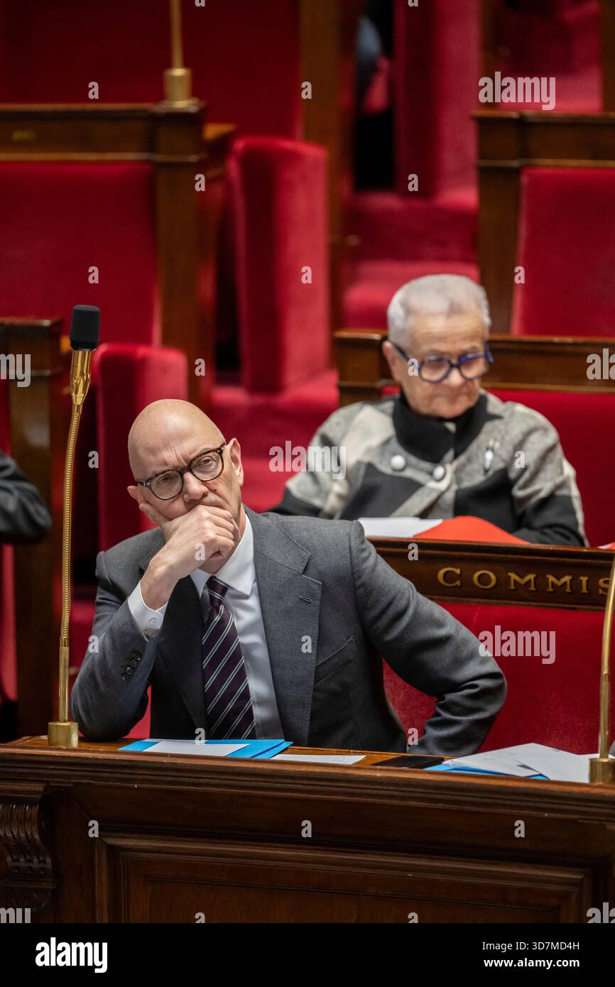 France's Economy and Finance Minister Roland Lescure gestures and looks ...