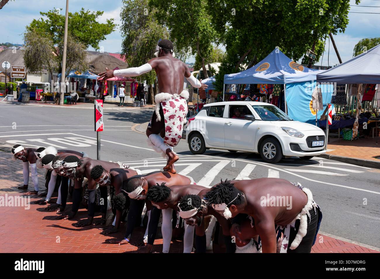 Zulu dancers perform on the street in Soweto, South Africa, Wednesday ...
