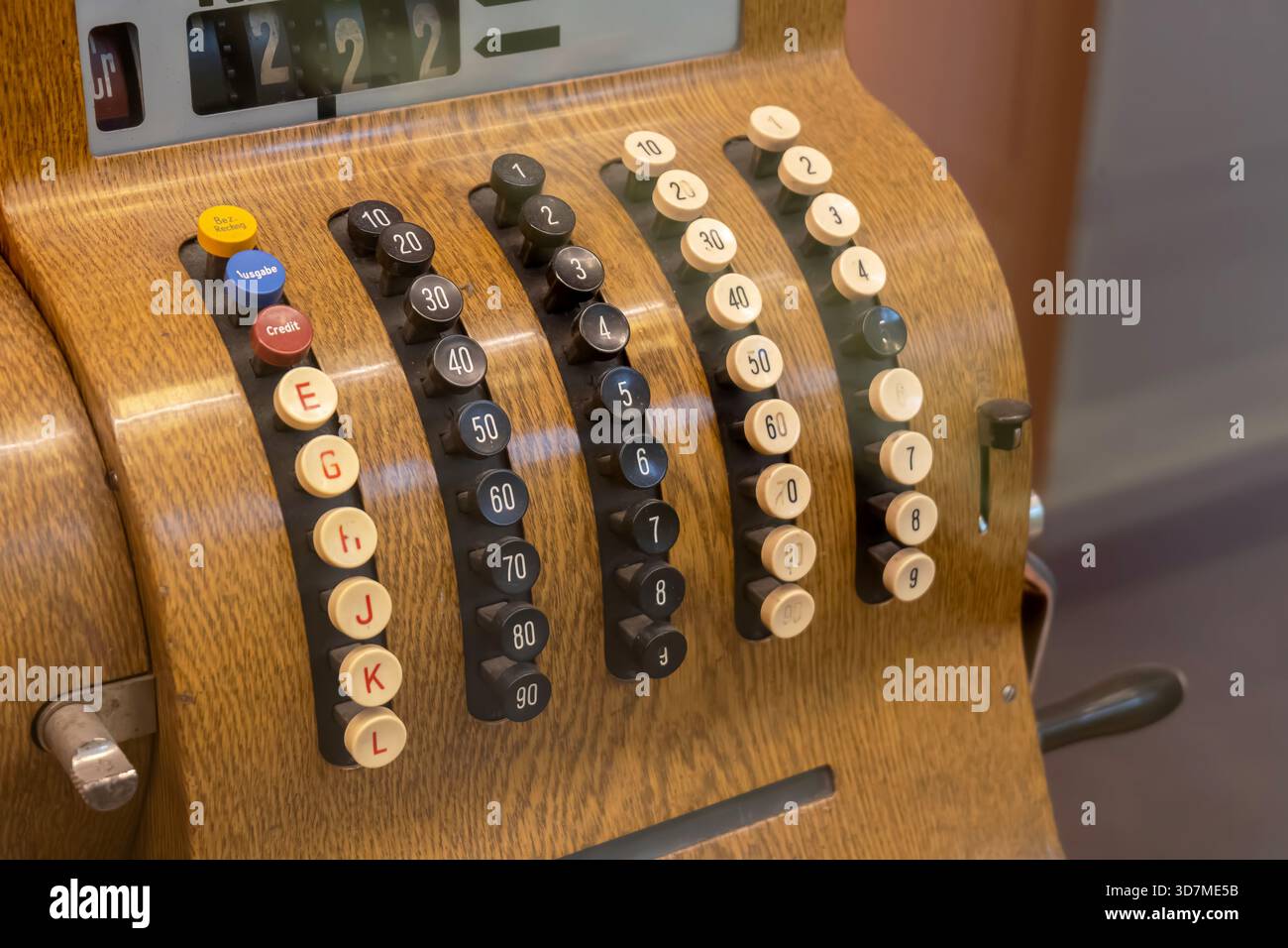 Vintage wooden analog cash register with numbered buttons levers and ...