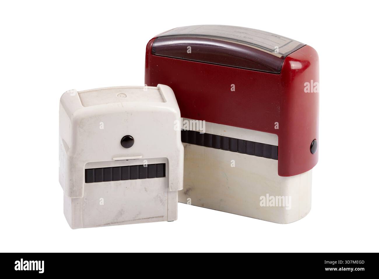 Two worn self-inking office stamps isolated on white background, cut ...