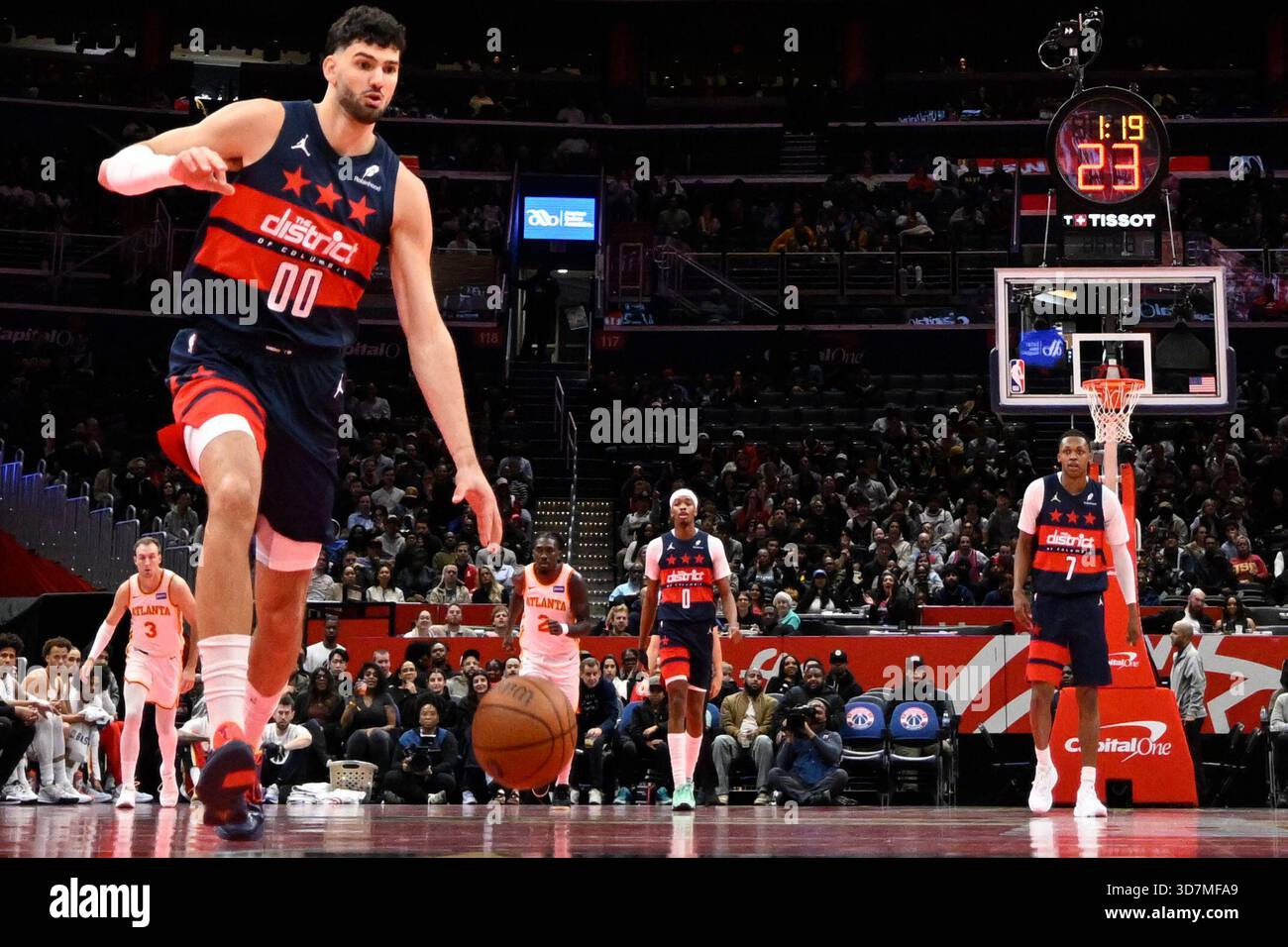 Washington Wizards forward Tristan Vukcevic (00) dribbles towards the ...
