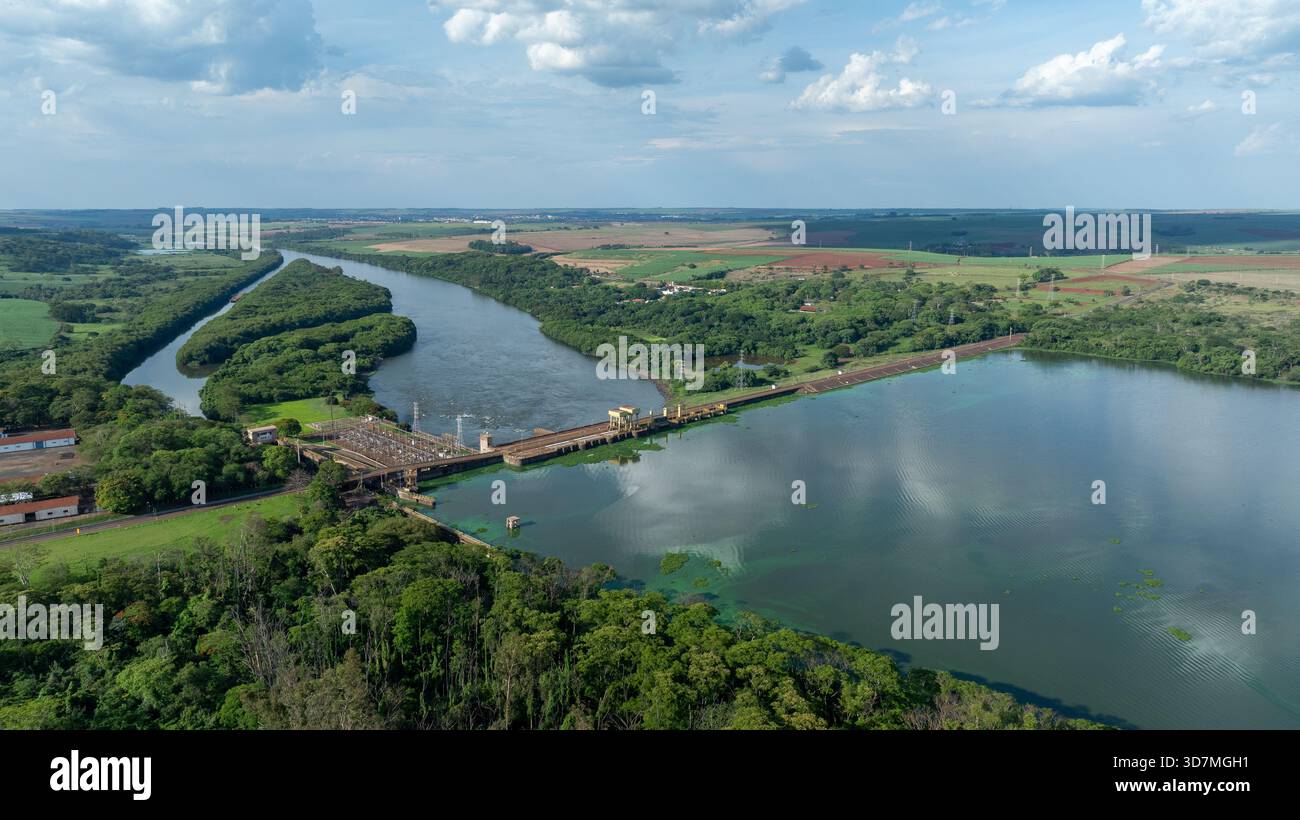 Aerial view of a lock on the Tiete River, showing the dammed and lower ...
