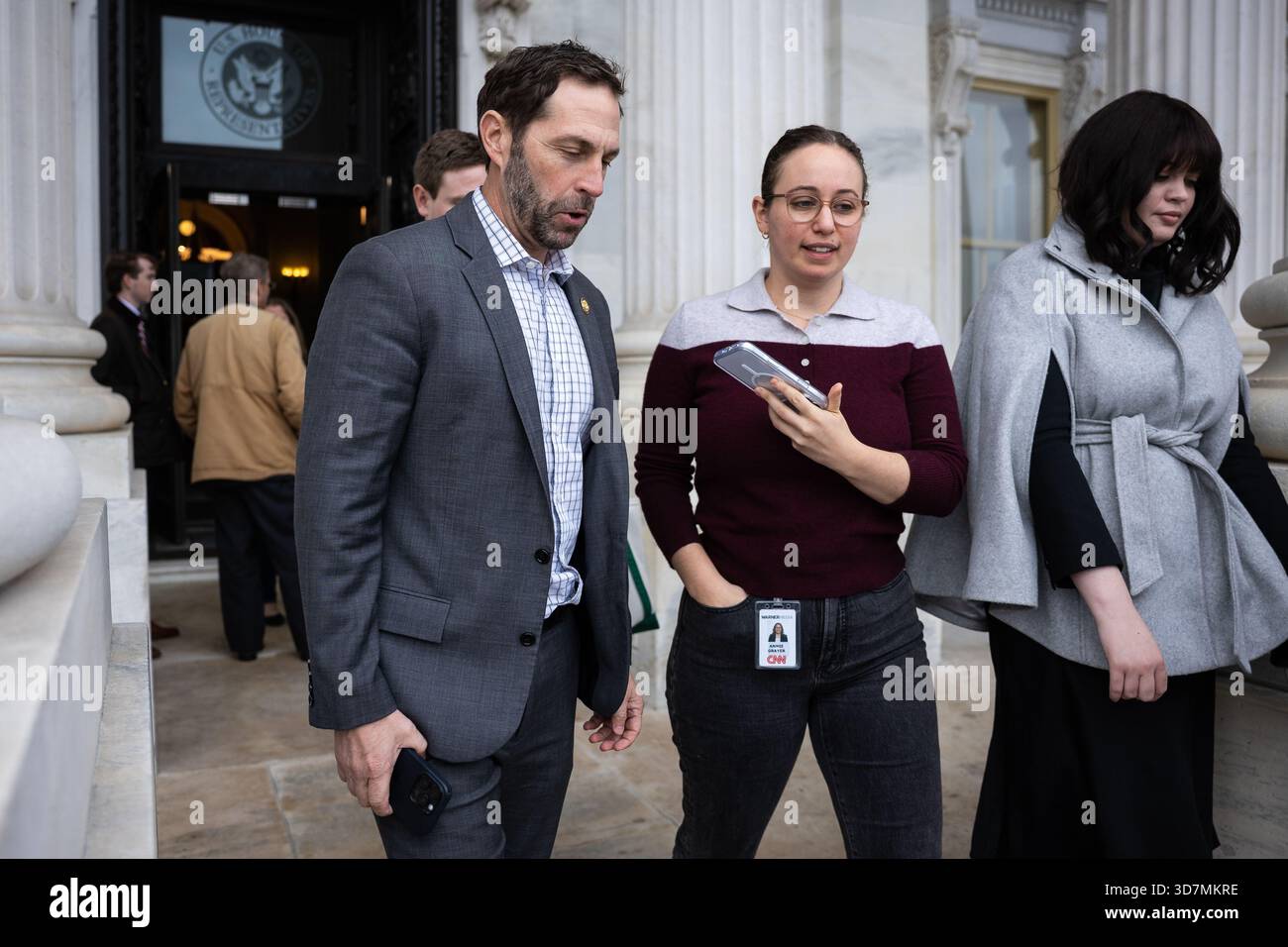 Rep. Jason Crow (D-Colo.) speaks with a reporter as he departs a vote ...