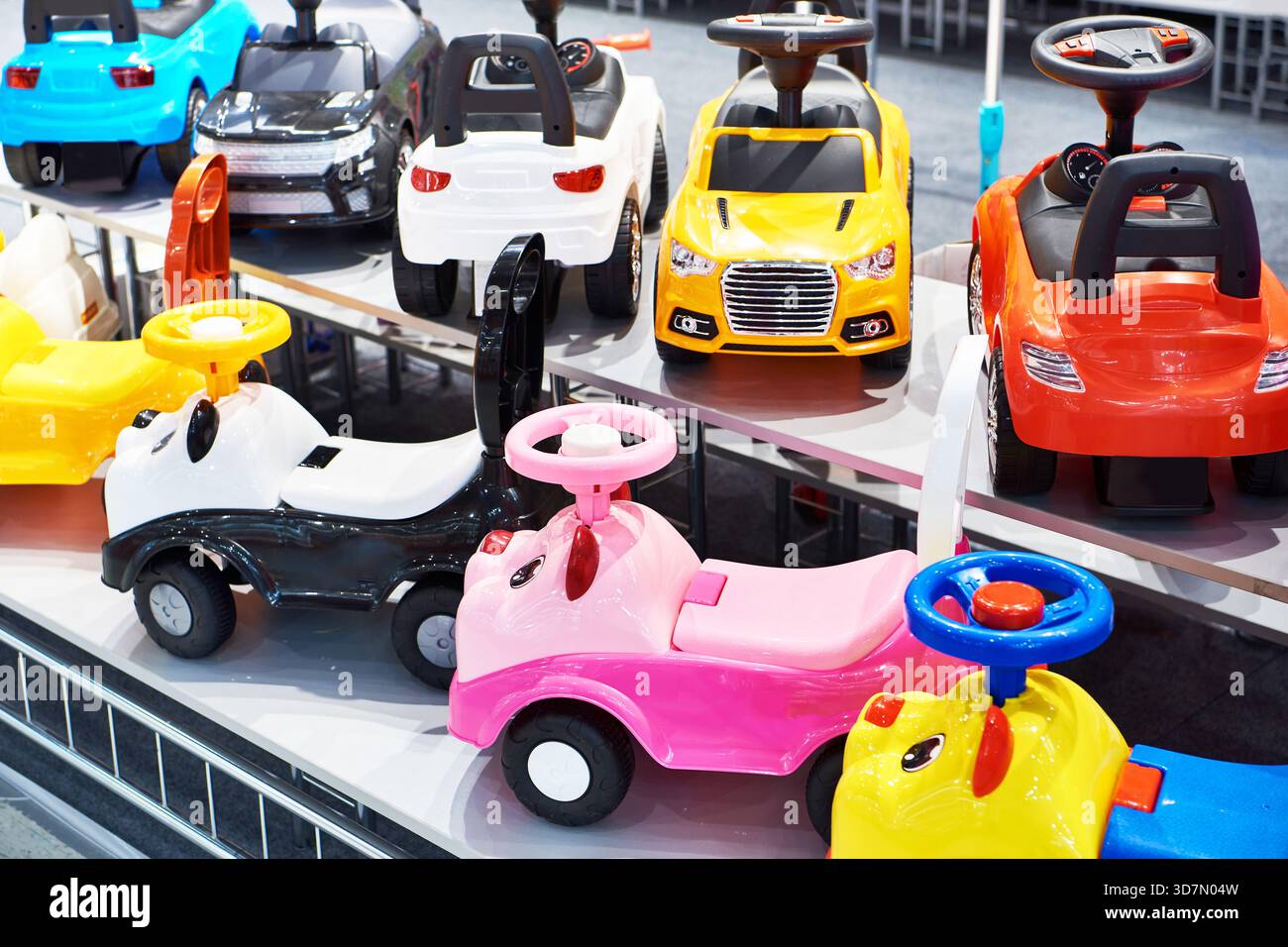 Plastic cars in a toy store Stock Photo - Alamy