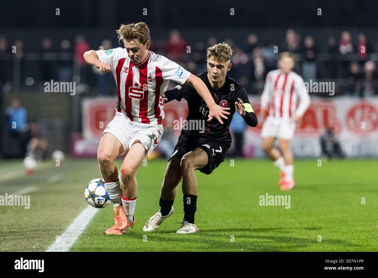 KOELN, GERMANY - NOVEMBER 26: Benjamin Ley (1. FC Koeln, 11) and Albert ...