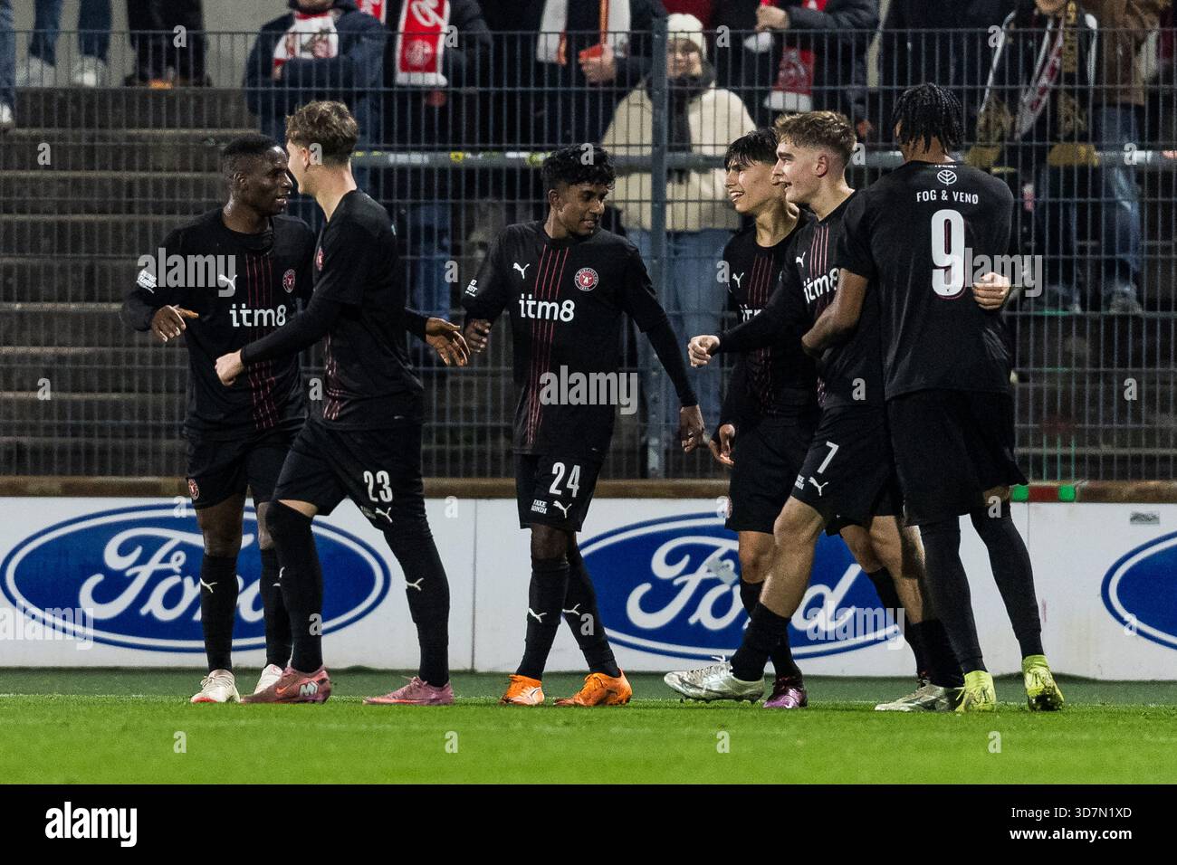 KOELN, GERMANY - NOVEMBER 26: players of FC Midtjylland celebrate the 0 ...