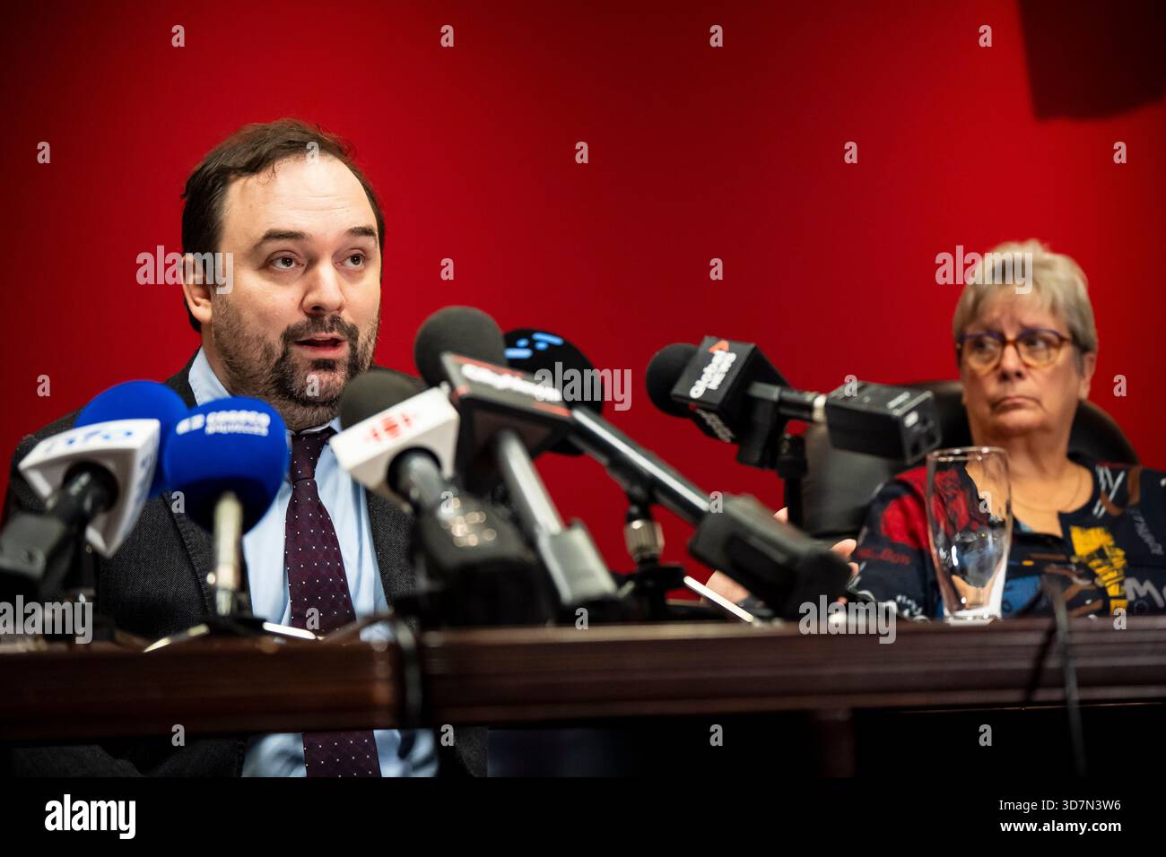 Lawyer Patrick Martin-Menard and Sylvie Brosseau participate in a press ...