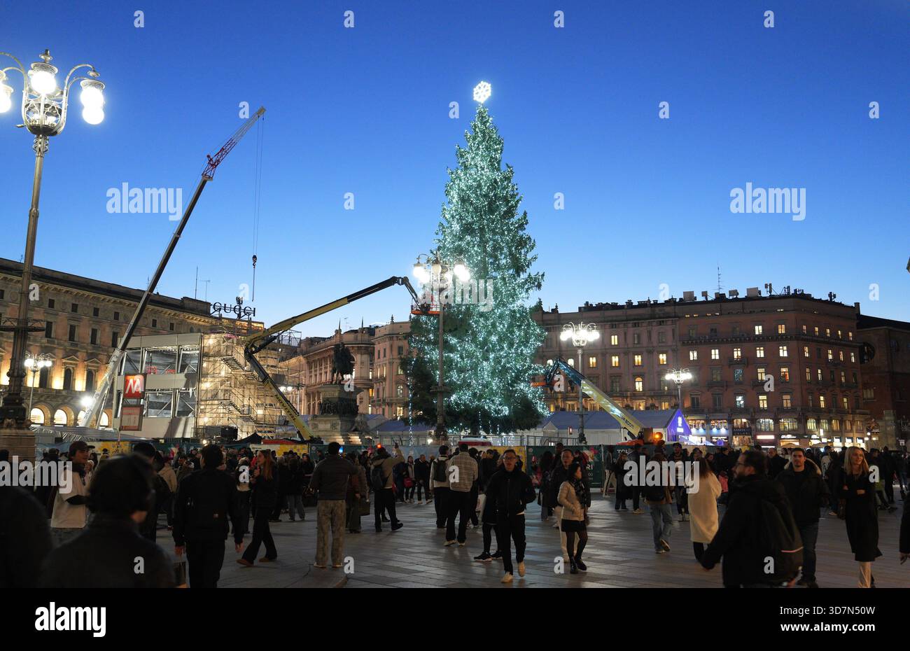 Milan - The Christmas tree in Piazza Duomo is lit up Stock Photo - Alamy