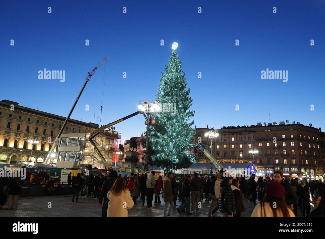 Milan - The Christmas tree in Piazza Duomo is lit up Stock Photo - Alamy