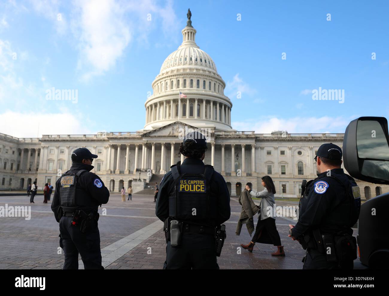 Capitol Police officers stand guard on the East Front of the U.S ...