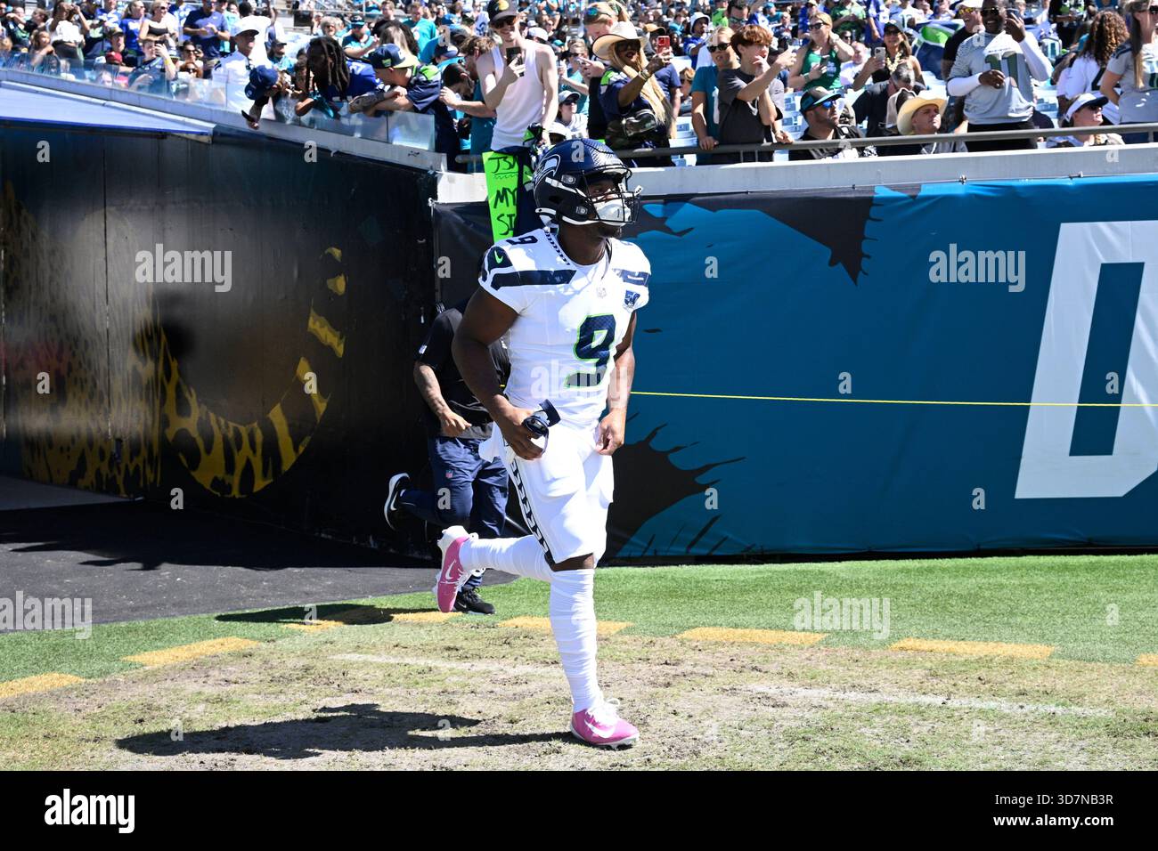 Seattle Seahawks running back Kenneth Walker III (9) heads to the field ...