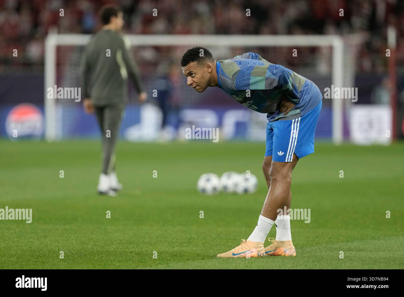 Real Madrid's Kylian Mbappe warms up prior to start of the Champions ...