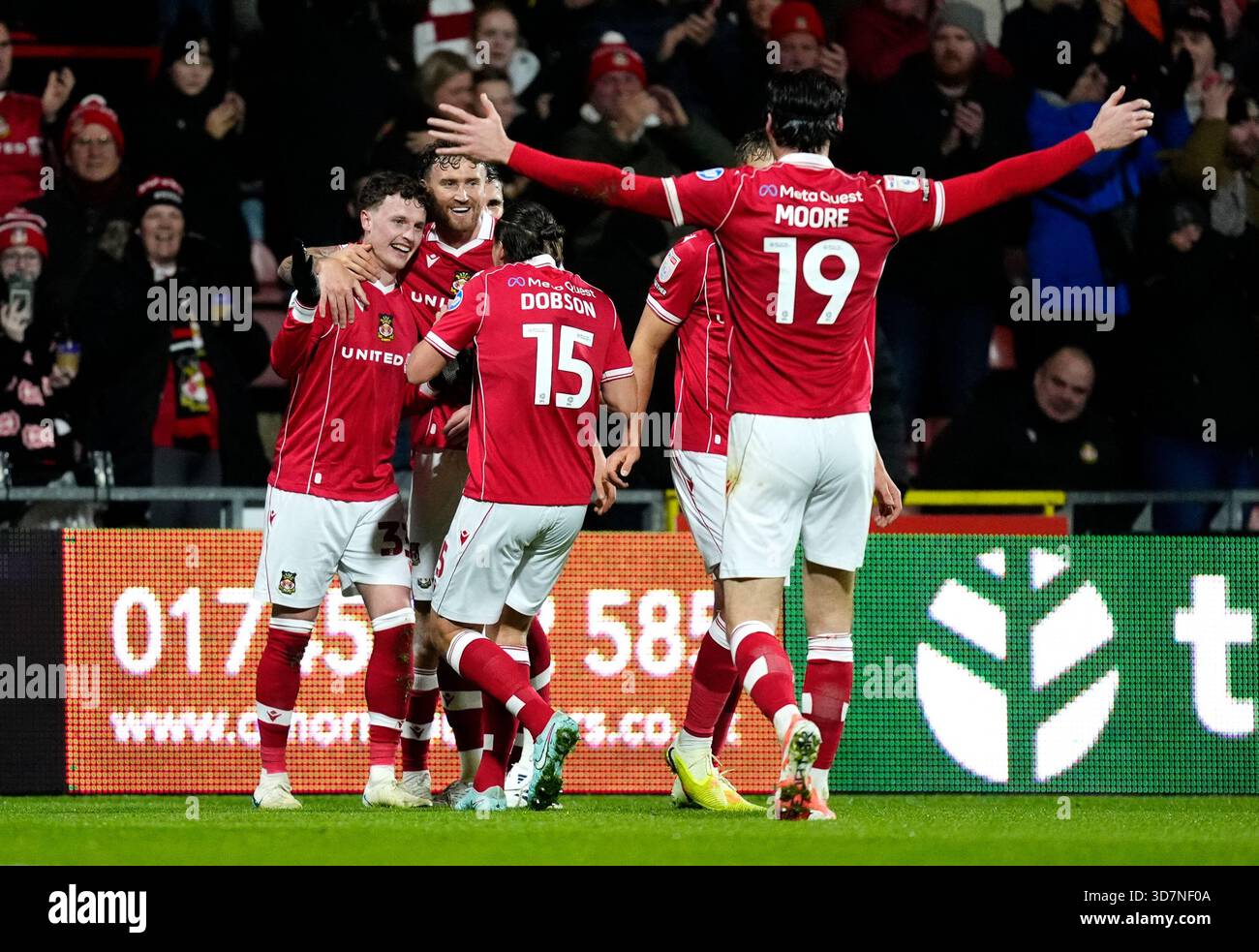 Wrexham's Nathan Broadhead (left) celebrates scoring their side's first ...