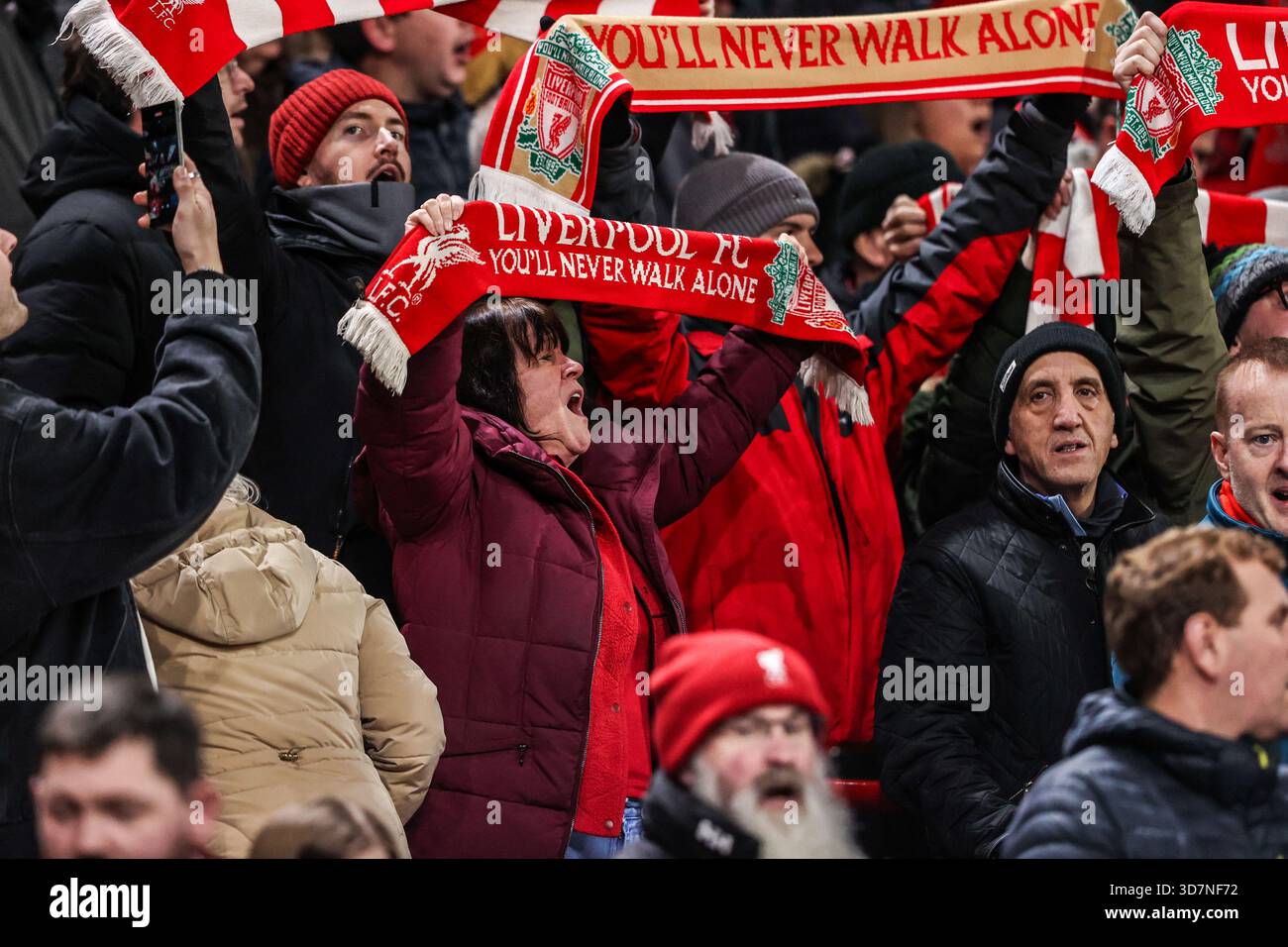 Liverpool fans sing ‘You’ll Never Walk Alone’ before the game during ...