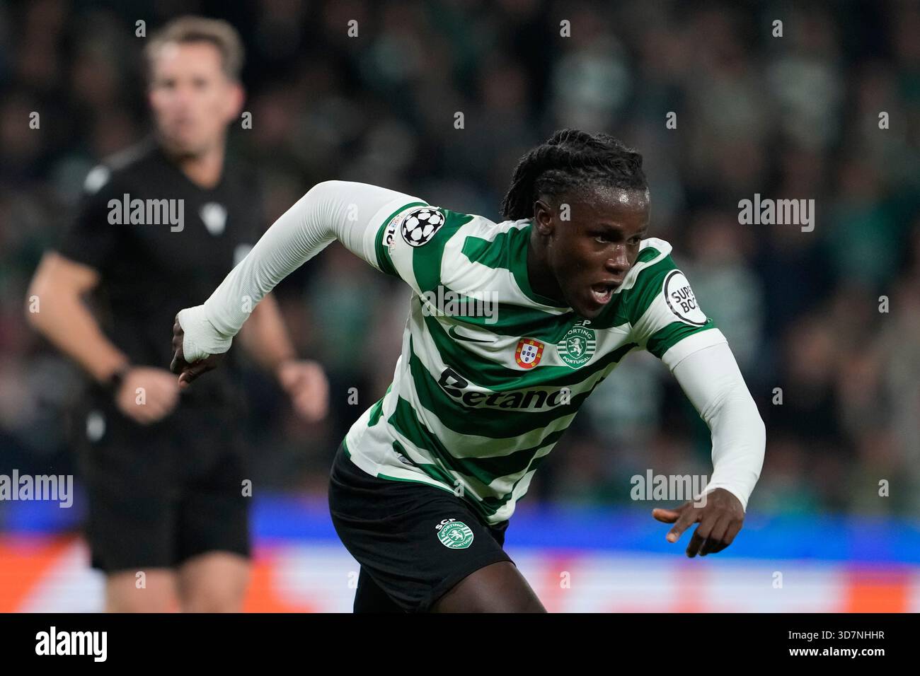 Sporting's Geovany Quenda celebrates after scoring during the Champions ...