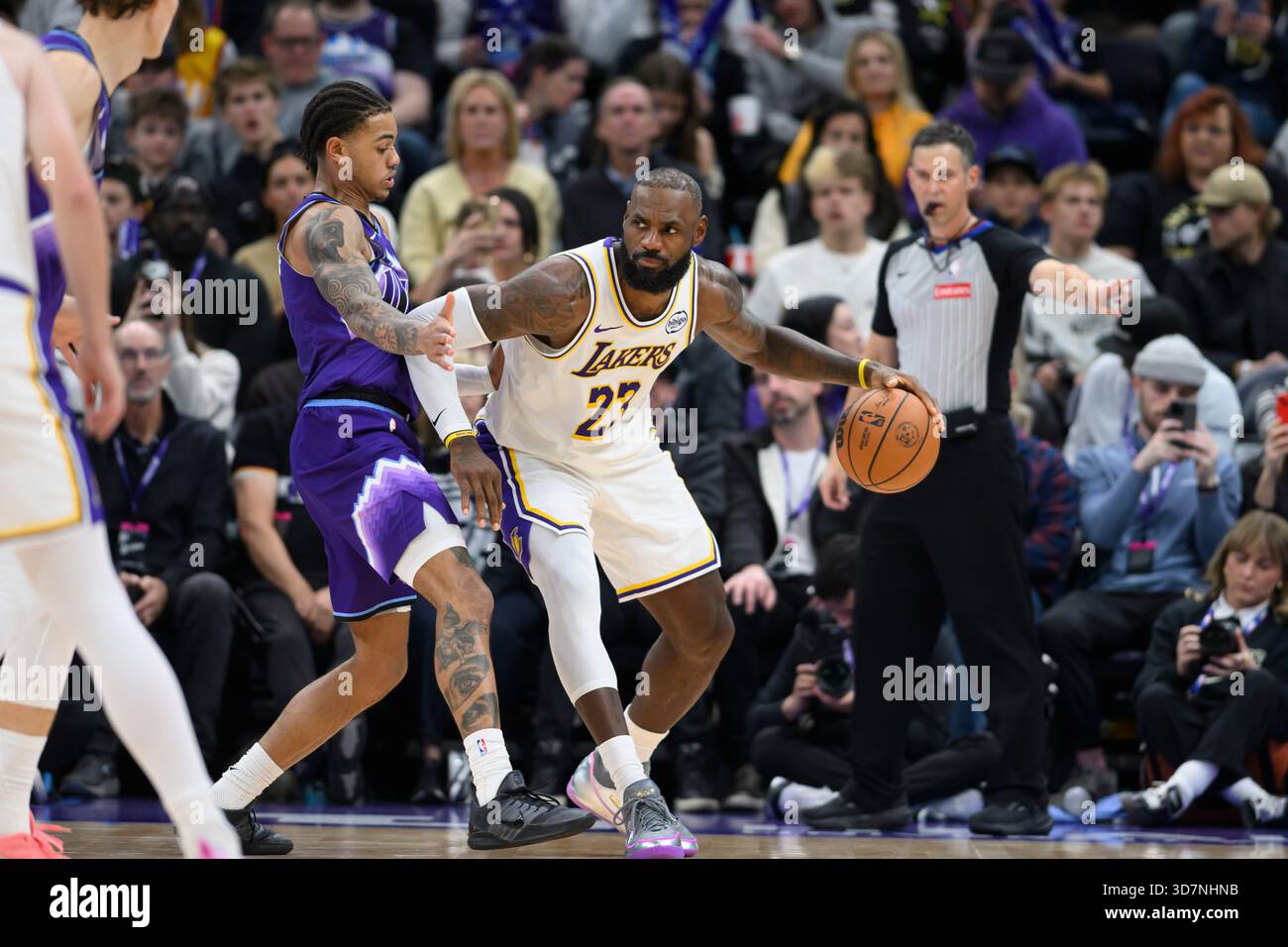 Los Angeles Lakers forward LeBron James, right, drives to the basket ...