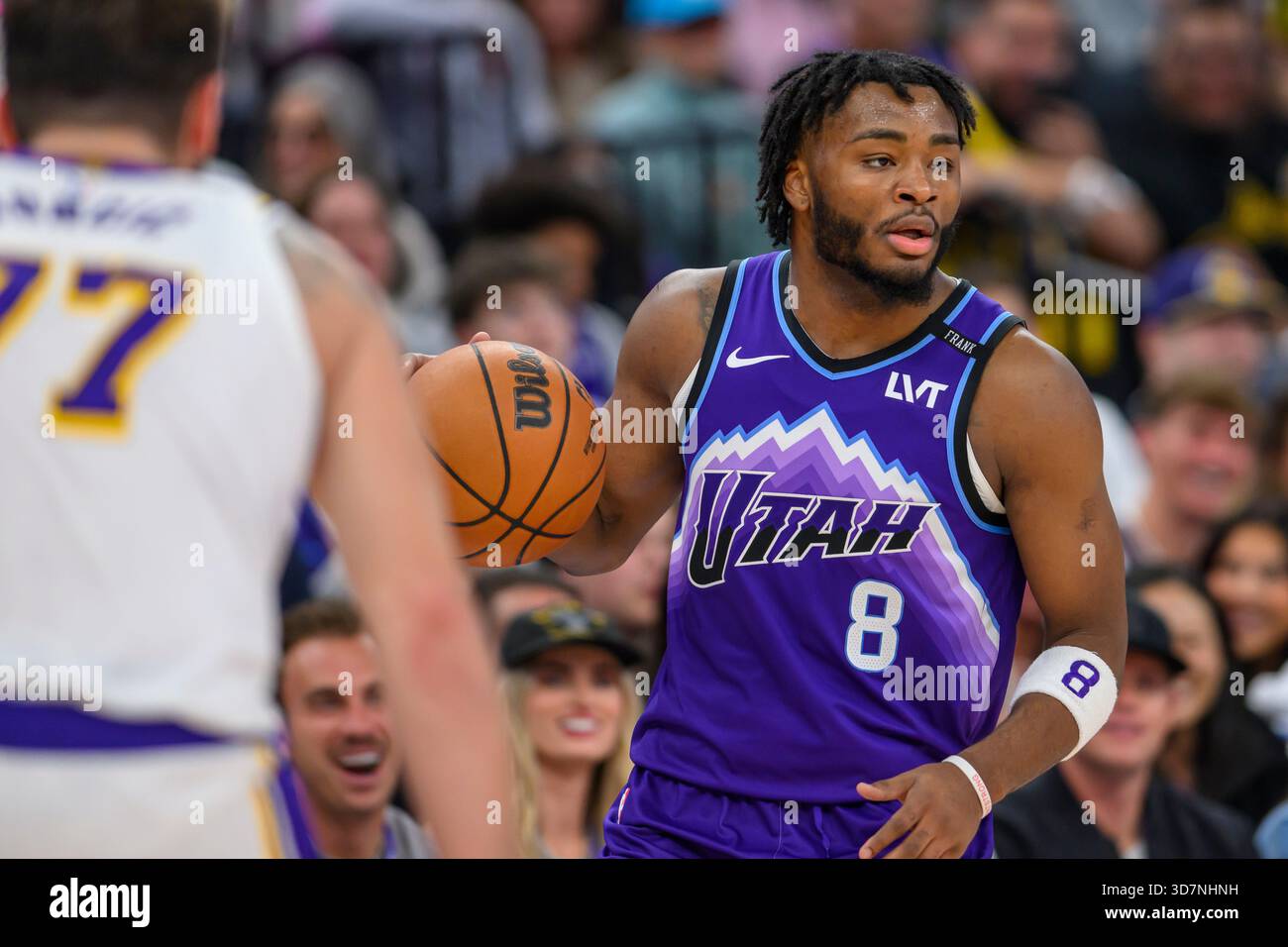 Utah Jazz guard Isaiah Collier (8) brings the ball up court during the ...