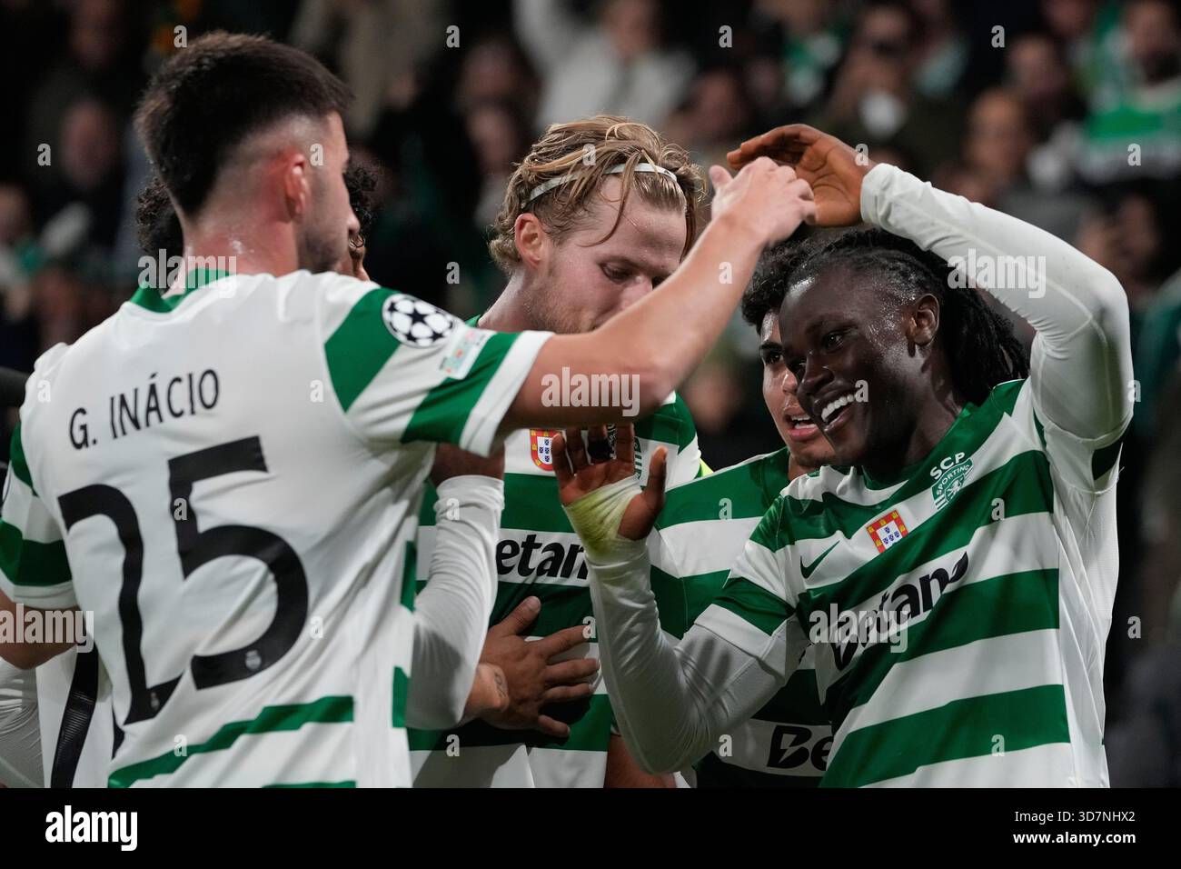 Sporting's Geovany Quenda, right, celebrates with teammates after ...