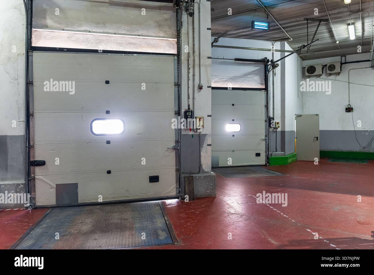 Logistic warehouse truck loading gates. Distribution warehouse building ...