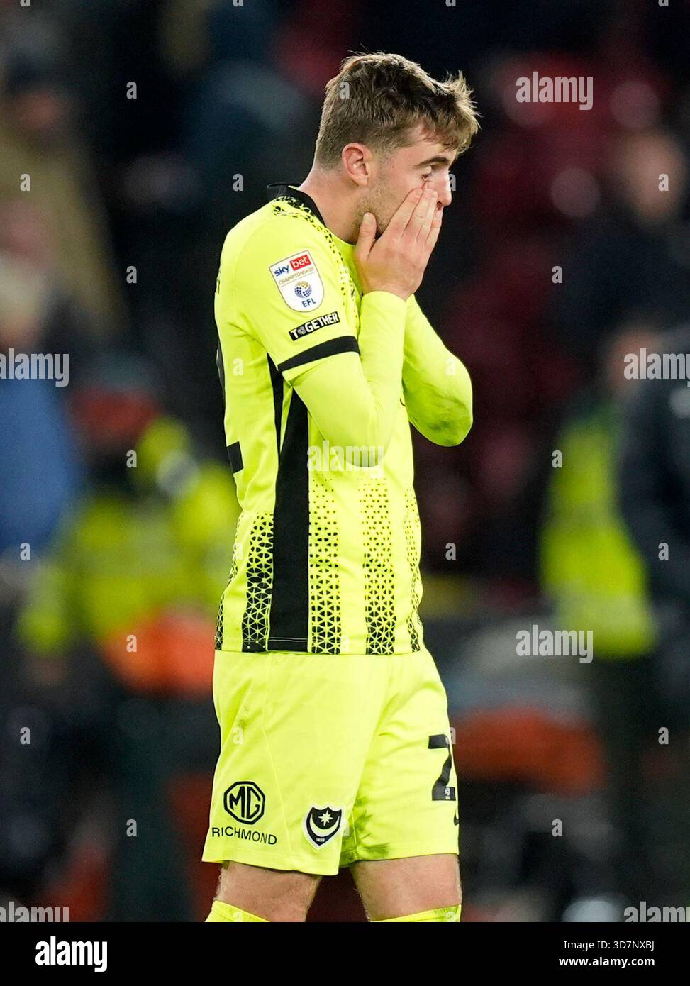 Portsmouth's Zak Swanson shows his dejection at the final whistle after ...