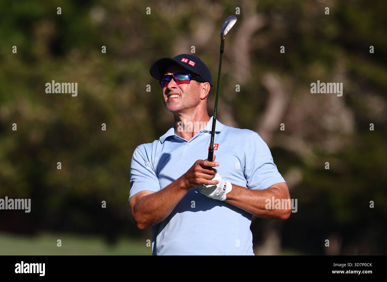 Adam Scott of Australia plays a shot on the 13th hole during the ...