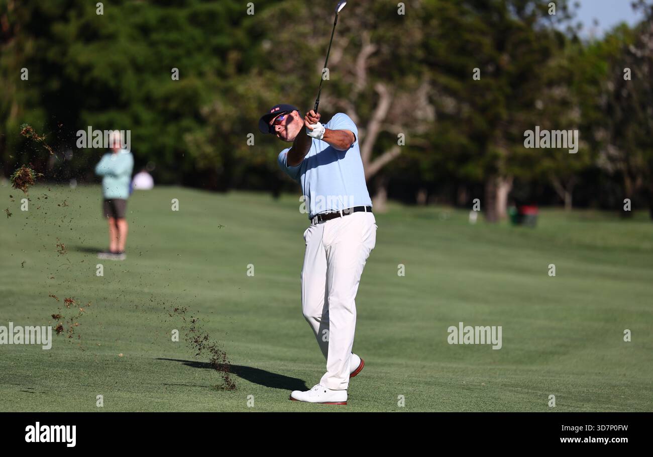 Adam Scott of Australia plays a shot on the 13th hole during the ...