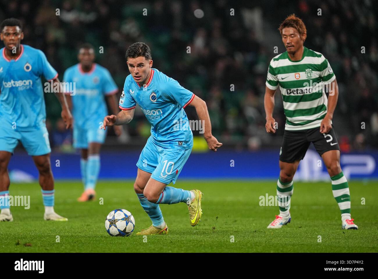 Club's Hugo Vetlesen and Sporting's Hidemasa Morita fight for the ball ...